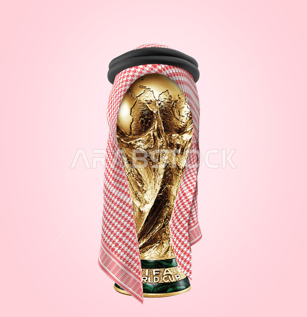 A close-up of the World Cup covered with the Qatari shemagh and ...