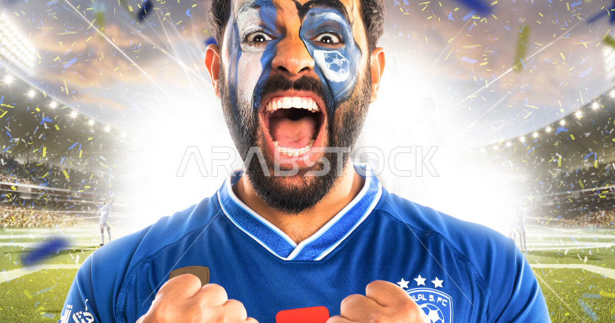 A Saudi Arabian Gulf youth wearing the Al Hilal Saudi Club T-shirt ...
