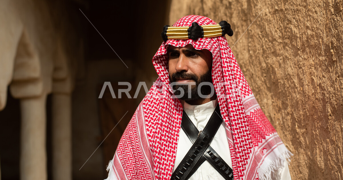 A Saudi Arabian Gulf man wearing the traditional Saudi folk costume ...