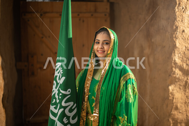 A Saudi Arabian Gulf girl wearing the traditional Saudi folk costume ...