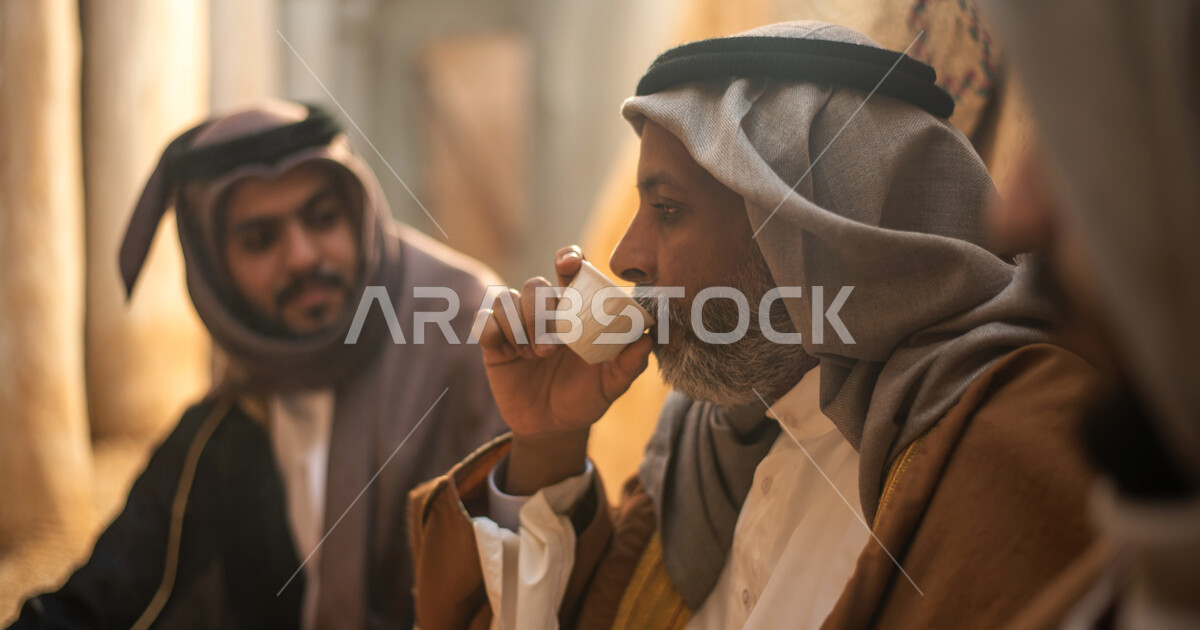 A group of Saudi Arab men, sitting in popular neighborhoods, Saudi ...