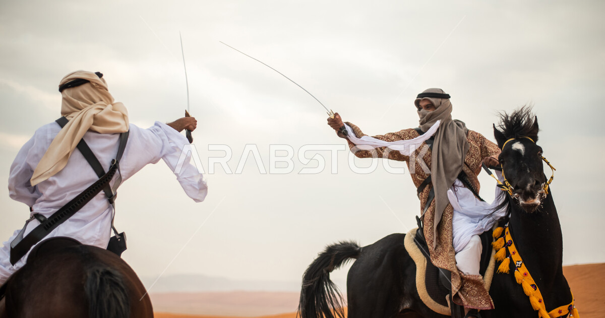 Two Saudi Arabian Gulf knights riding horses in the Saudi desert and jousting, dueling swords ...