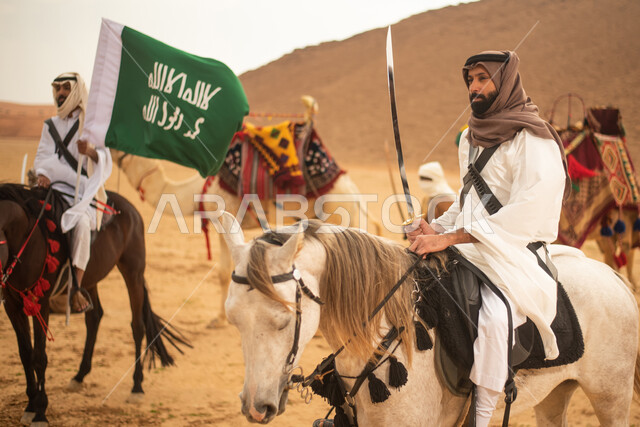 Saudi Arabian Gulf knights riding Arabian horses in the Saudi desert ...