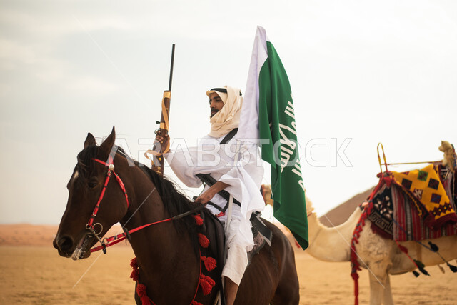 A Saudi Arabian Gulf knight riding the Arabian horse in the Saudi ...