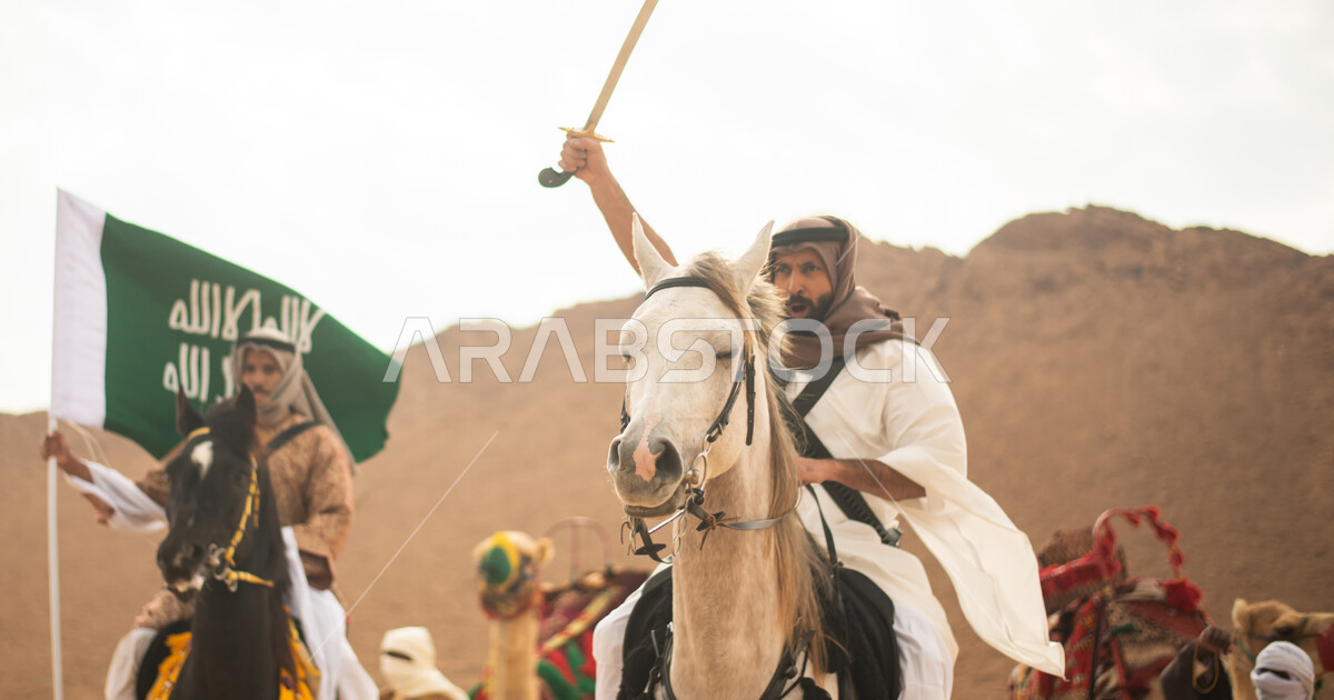 Saudi Arabian Gulf knights riding Arabian horses in the Saudi desert ...