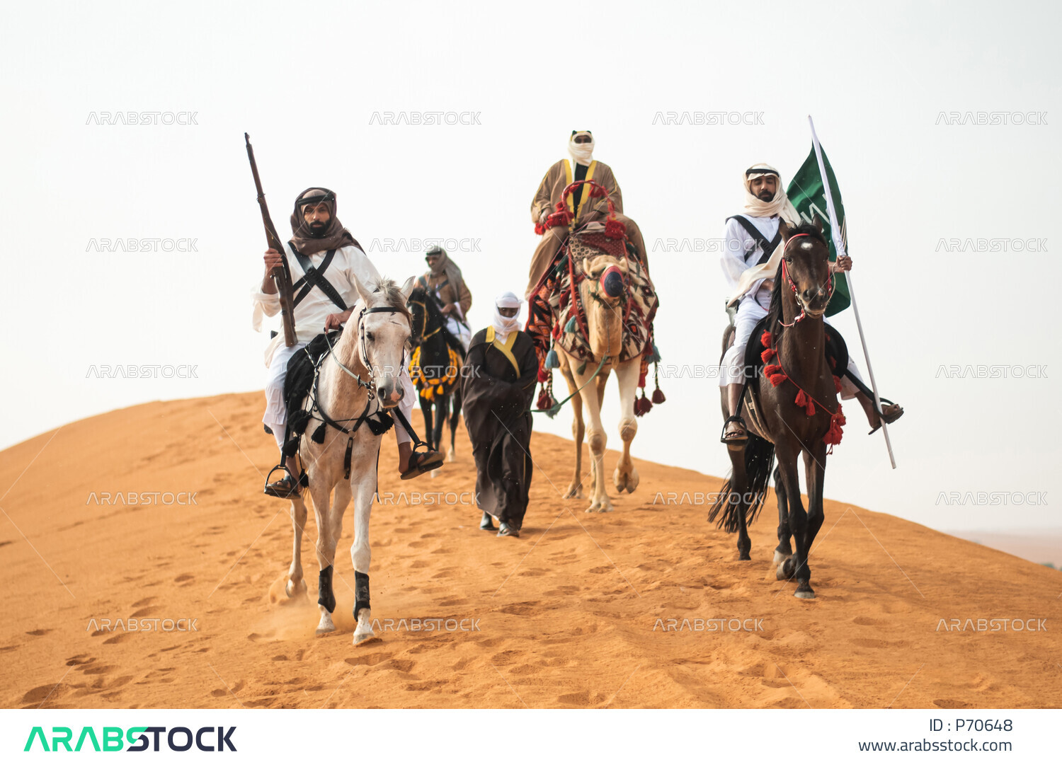 Saudi Gulf Arab knights riding horses in the Saudi desert, using swords ...