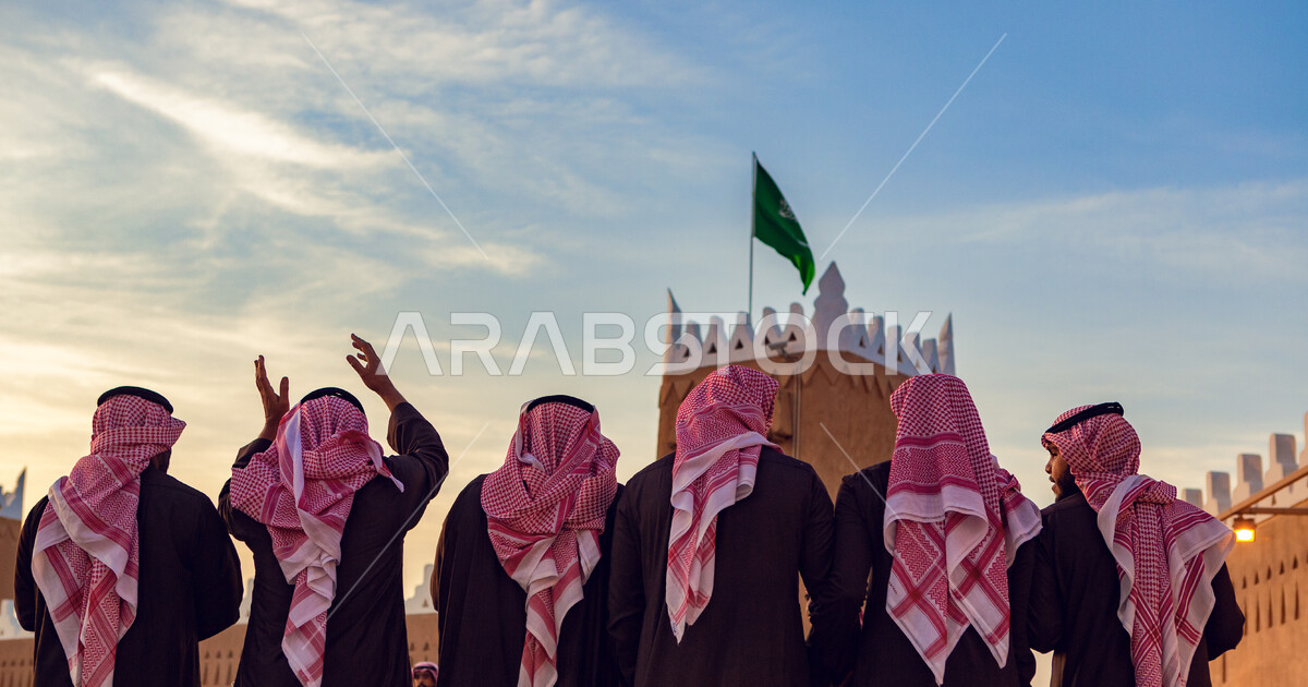 Photography from the back of a group of Saudi Arab Gulf men, the Saudi ...