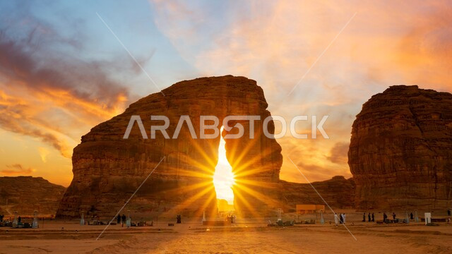 Elephant Mountain at sunset among the golden desert sands in Al-Ula ...