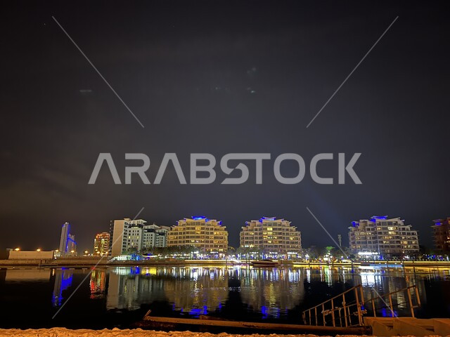 King Faisal Corniche in Manama in the Kingdom of Bahrain in night mode ...