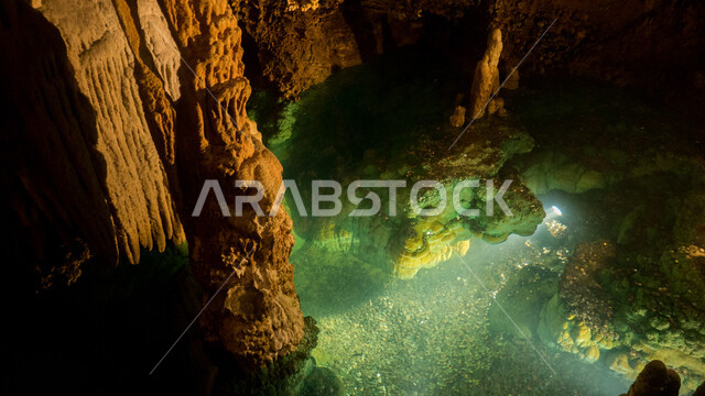 A close-up of a stone cave, an ancient archaeological cave, heritage ...