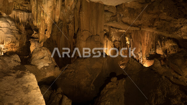 A close-up of a stone cave, an ancient archaeological cave, heritage ...