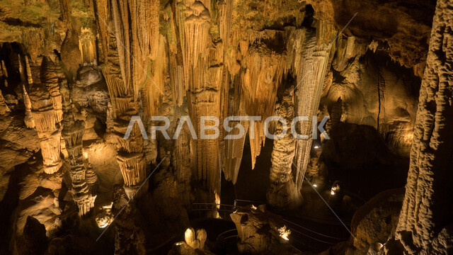 A close-up of a stone cave, an ancient archaeological cave, heritage ...