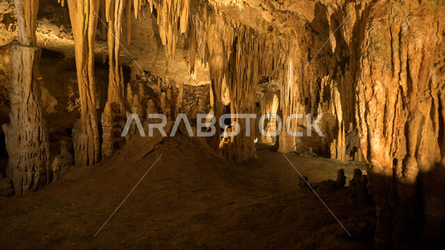 A close-up of a stone cave, an ancient archaeological cave, heritage ...