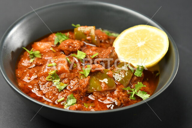 Edam chicken dish on a black surface, Arabic food, Saudi restaurant ...