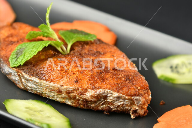 A dish of fish fillet, seafood, Arabic food, a healthy nutritional meal ...