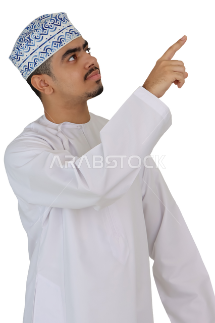 Portrait of an Omani Arab man pointing up with his index finger ...