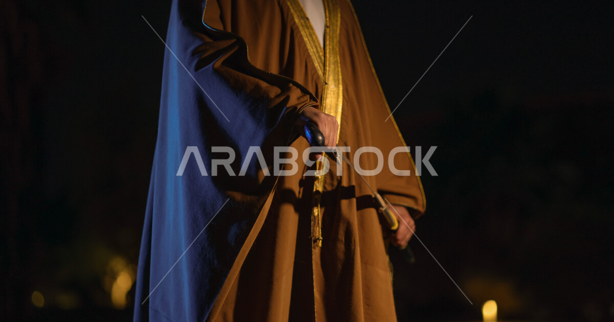 A Saudi Arab Gulf man wears a Saudi traditional costume for national ...