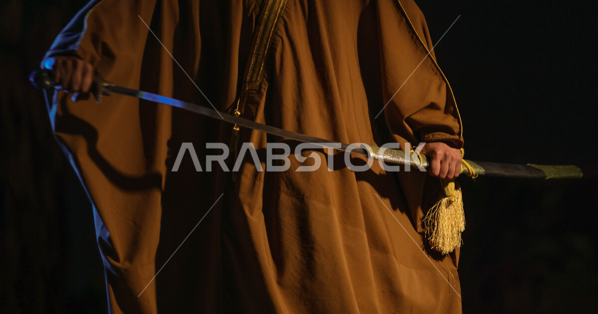 A Saudi Arab Gulf man wears a Saudi traditional costume for national ...