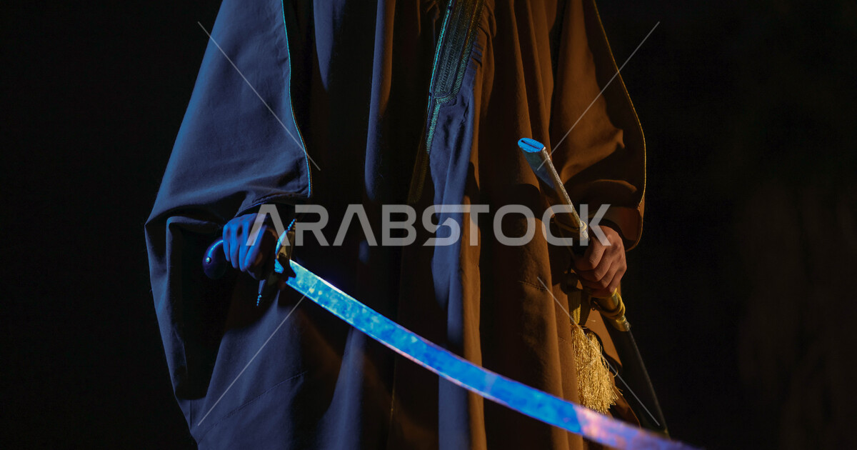 A Saudi Arab Gulf man wears a Saudi traditional costume for national ...