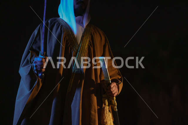A Saudi Arab Gulf man wears a Saudi traditional costume for national ...