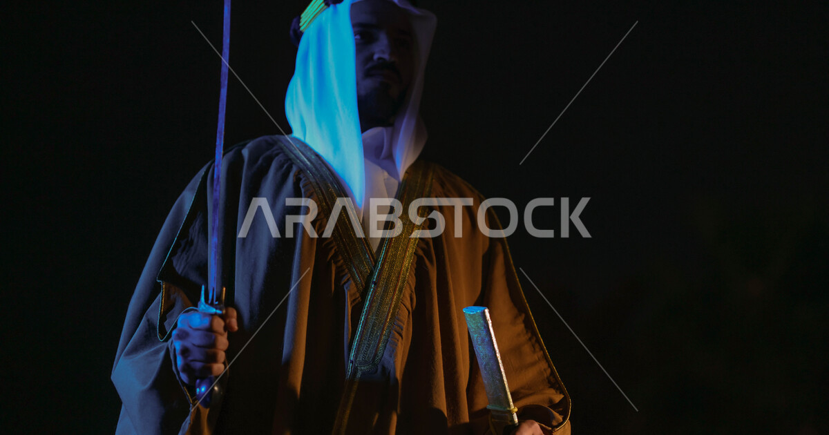 A Saudi Arab Gulf man wears a Saudi traditional costume for national ...
