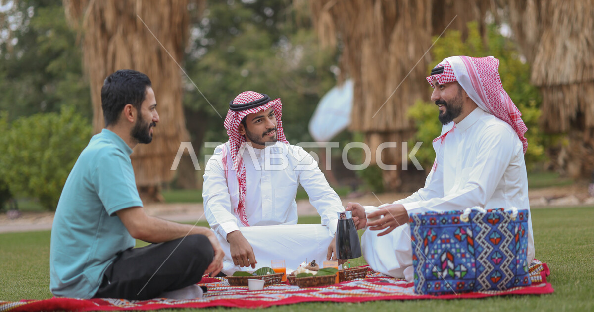 Young Saudi Gulf Arabs spending fun times in a public park, youth ...