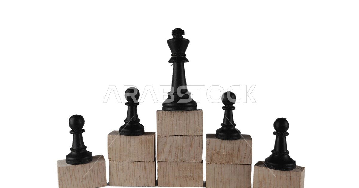 Chess pieces over wooden blocks, wooden pieces, chess pieces, stacking ...