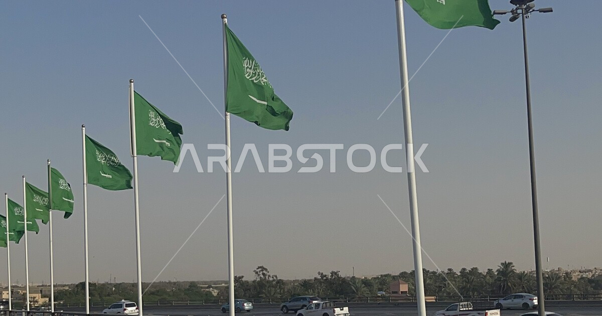 Saudi flags, Saudi roads and streets, the Saudi national flag flying ...