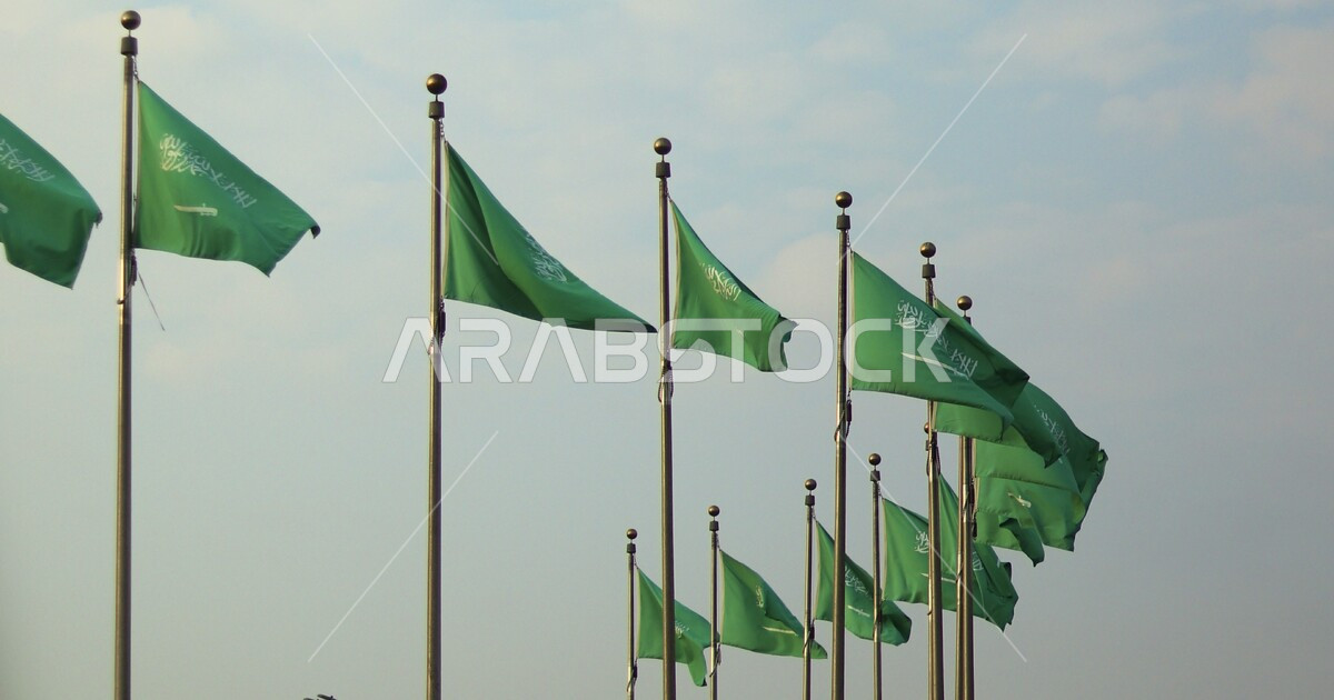 Saudi flags, Saudi roads and streets, the Saudi national flag flying ...
