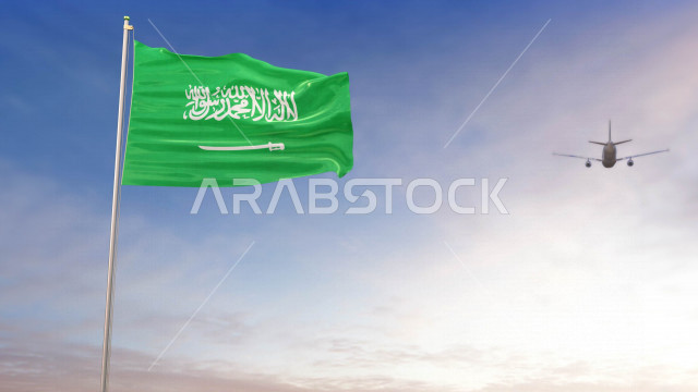 The Saudi national flag flutters high with a plane in the sky of Saudi ...