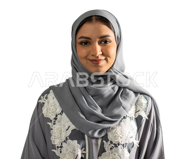 Portrait of a smiling Saudi Arab Gulf woman, wearing the Saudi abaya ...