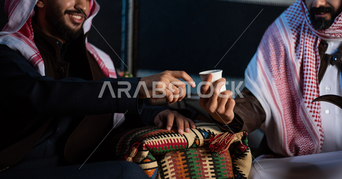 Providing Arabic coffee to guests, good hospitality and generosity ...