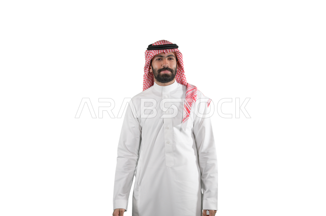 Portrait of a Saudi Arabian Gulf youth wearing traditional Saudi dress ...