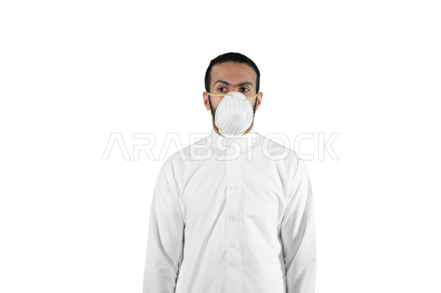 Portrait of a Saudi Arabian Gulf youth, wearing a protective mask ...