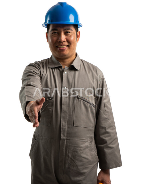 Portrait of a Filipino architect extending his hand with handshake ...