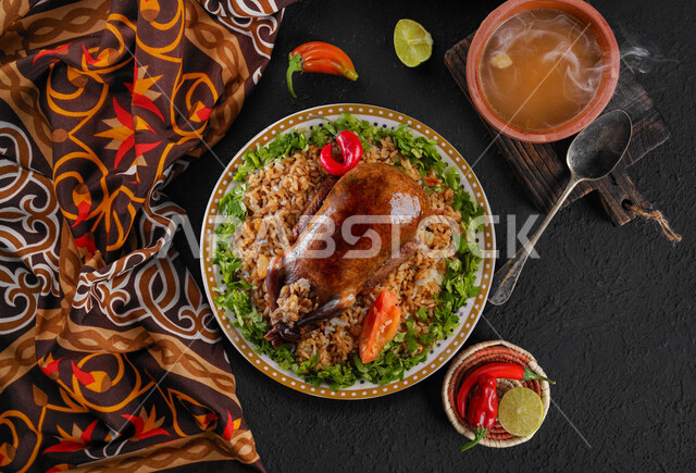 Popular rice dish with stuffed pigeons, Arabic food, oriental ...