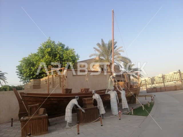 An old wooden boat in the Dubai Museum in the United Arab Emirates ...