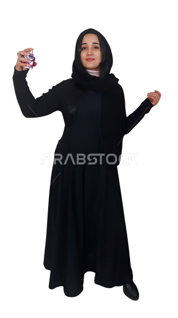 Chroma of an elegant Saudi Arab Gulf woman spraying perfume, women's ...