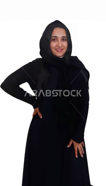 Portrait of a smiling Saudi Arabian Gulf woman in traditional dress ...