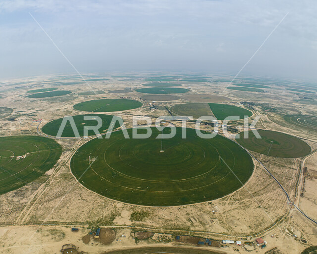 An aerial photograph of circular agricultural fields, an agricultural ...