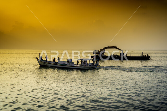 Wooden fishing boats at sea, sunset, calm sea, stunning scenery ...