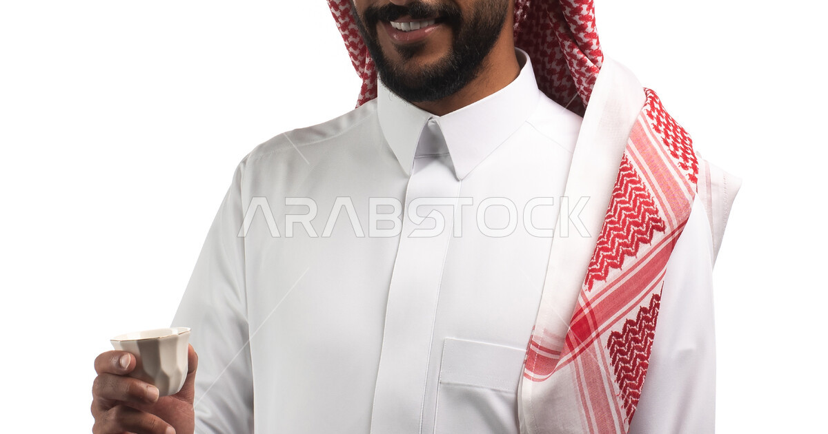 Honoring the guest, a portrait of a Saudi Arabian Gulf man wearing the ...