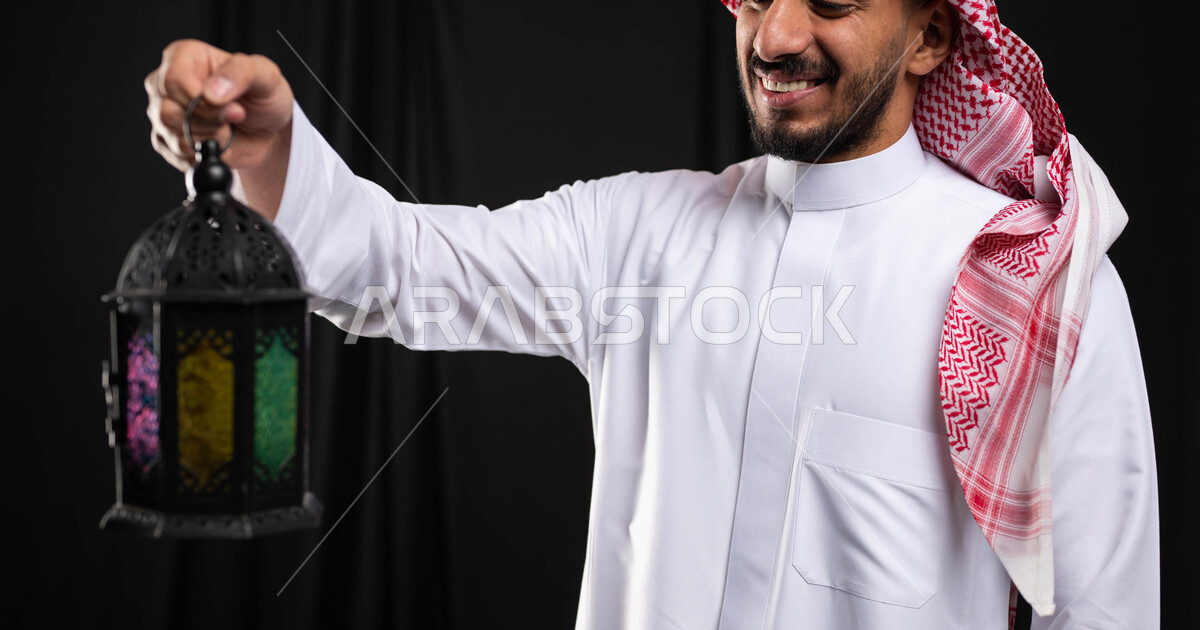 Portrait of a Saudi Arabian Gulf man, Ramadan lantern, preparation for ...
