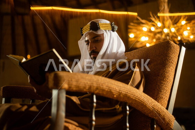 A Saudi Gulf Arab man wears a Saudi traditional costume for national ...