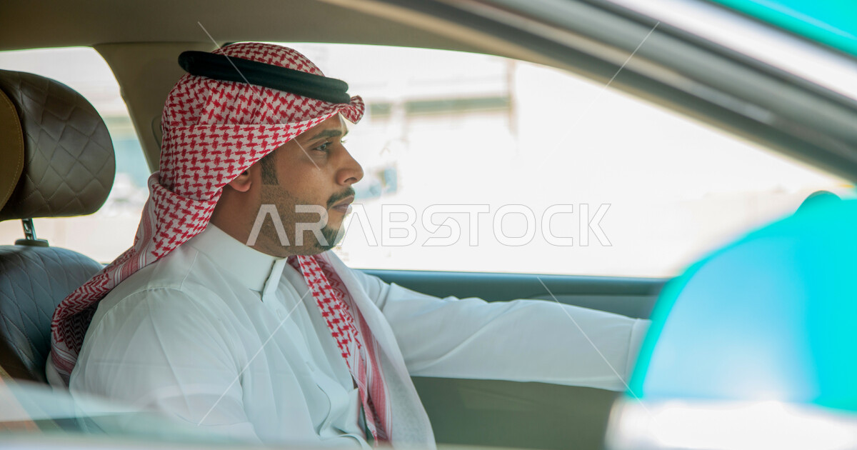 Saudi Arabian Gulf driver driving a taxi, passenger delivery service ...