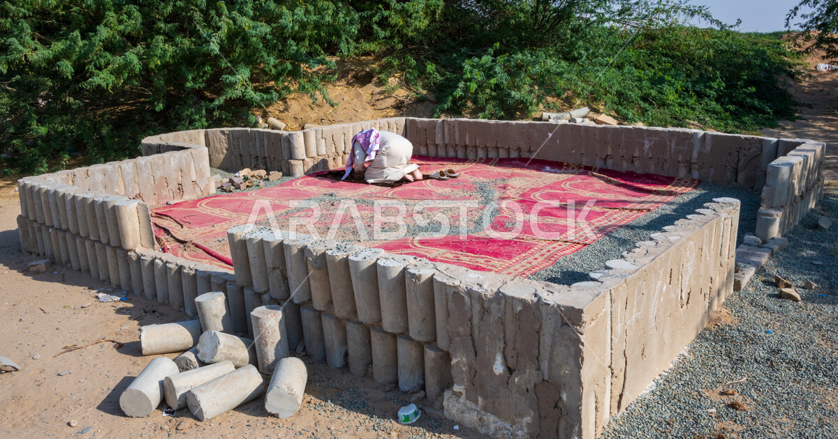 A Saudi Arabian Gulf man prays in an open-air mosque near the Jeddah ...