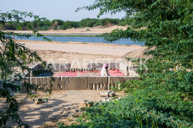 A Saudi Arabian Gulf man prays in an open-air mosque near the Jeddah ...