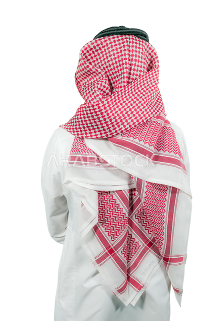 Portrait from the back of a Saudi Arabian Gulf man wearing traditional ...