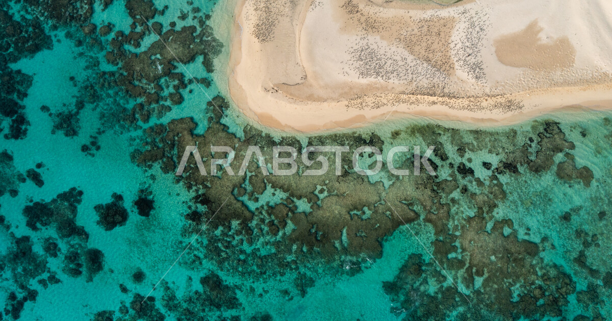 Aerial photograph of blue waters and white sands on Kedambel Island on ...