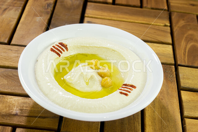 A plate of delicious hummus, traditional Arab dishes, Arab food ...
